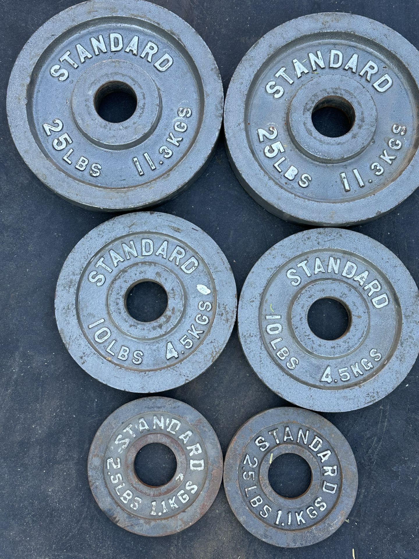 75 Lb Standard Olympic Weight Set (25s, 10s, & 2.5s) for Sale in ...