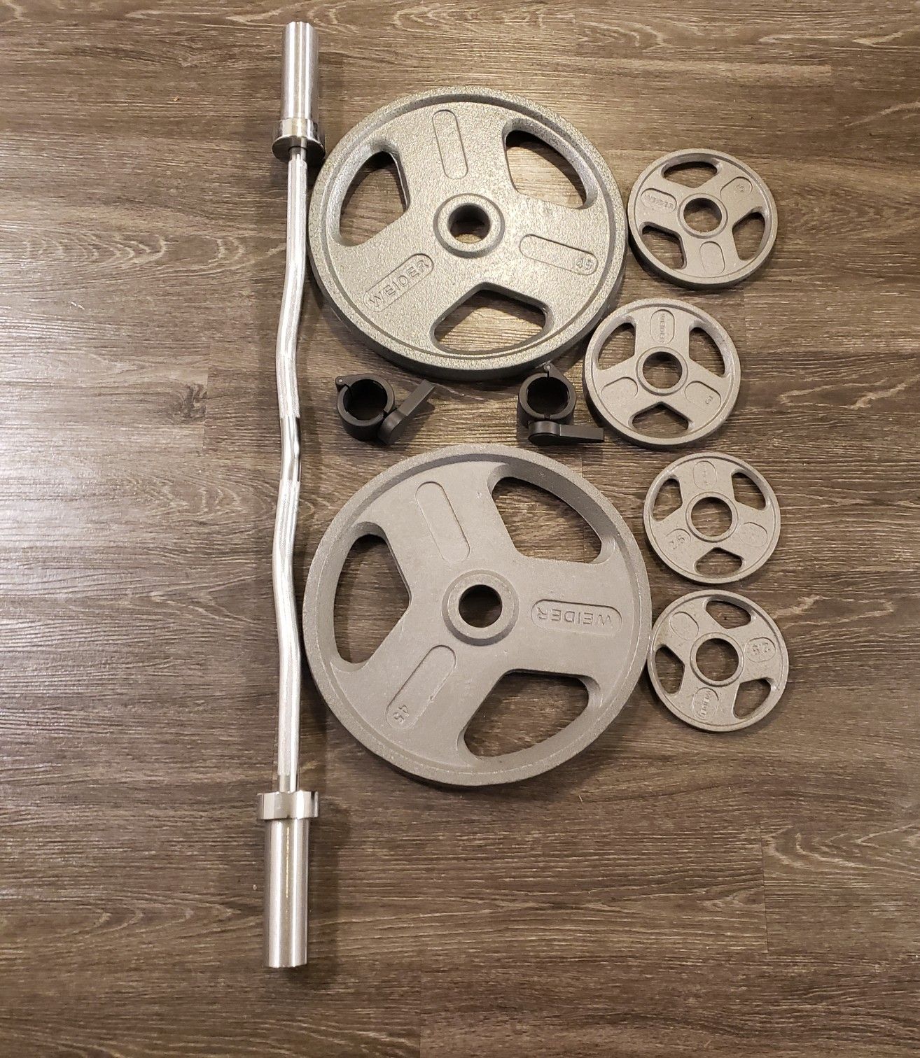 45 lbs weight plates ( $35/each). Olympic Tricep curl bar $45. 2 sets ...