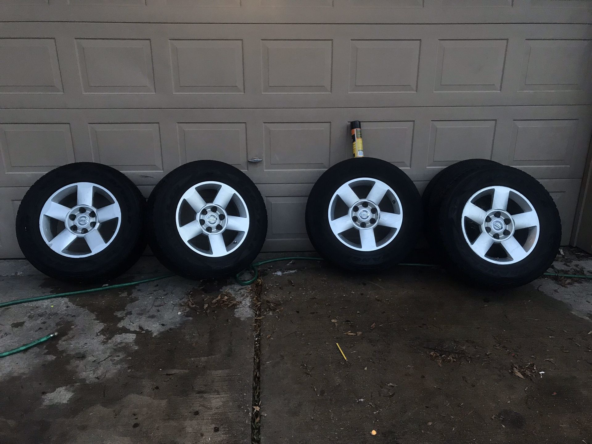 Nissan 18 inch rims, full set, 265-75-18. Usable tired attached. for ...