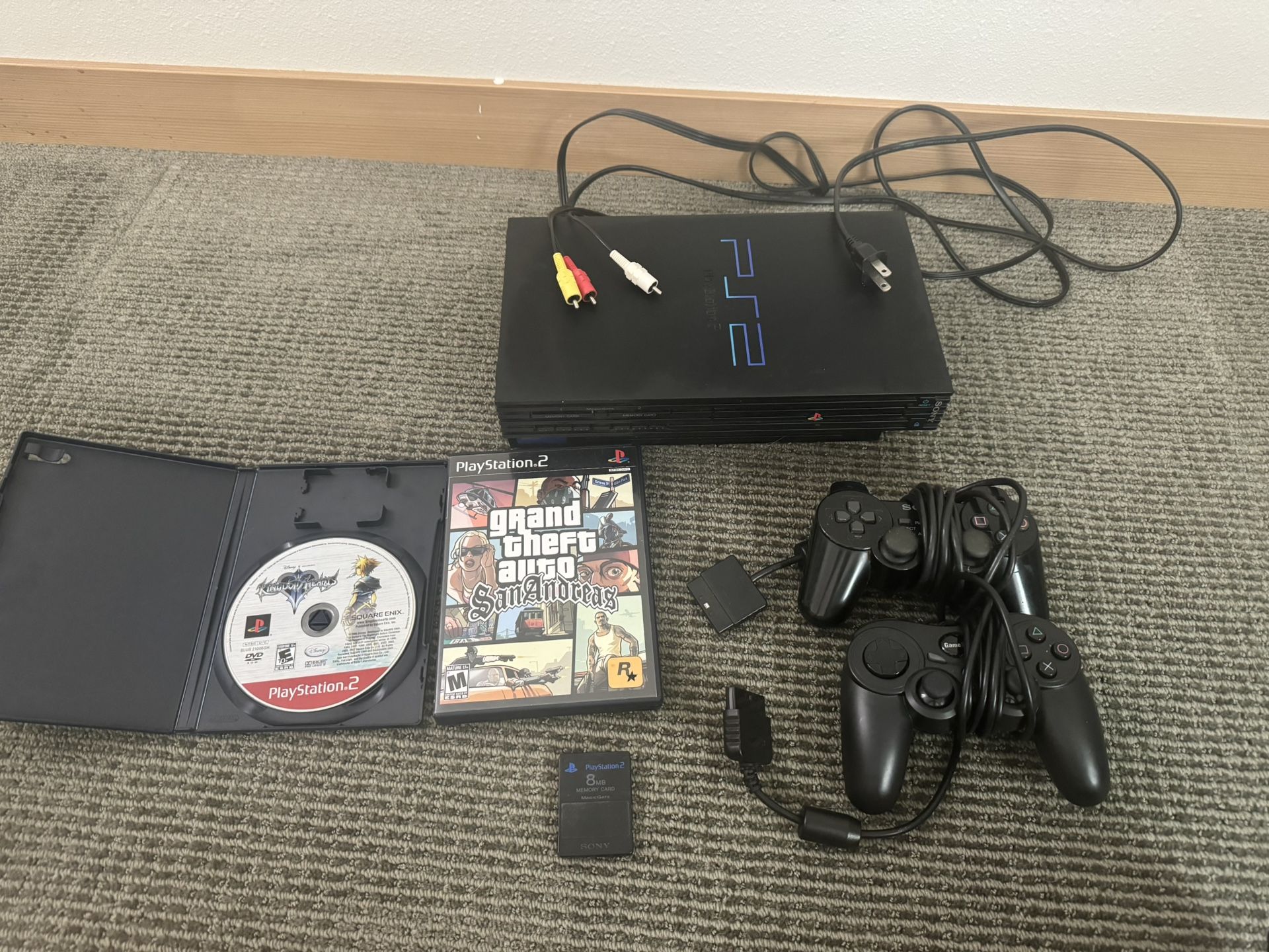 PlayStation 2 Console with Controllers & Games Description: PS2 console ...