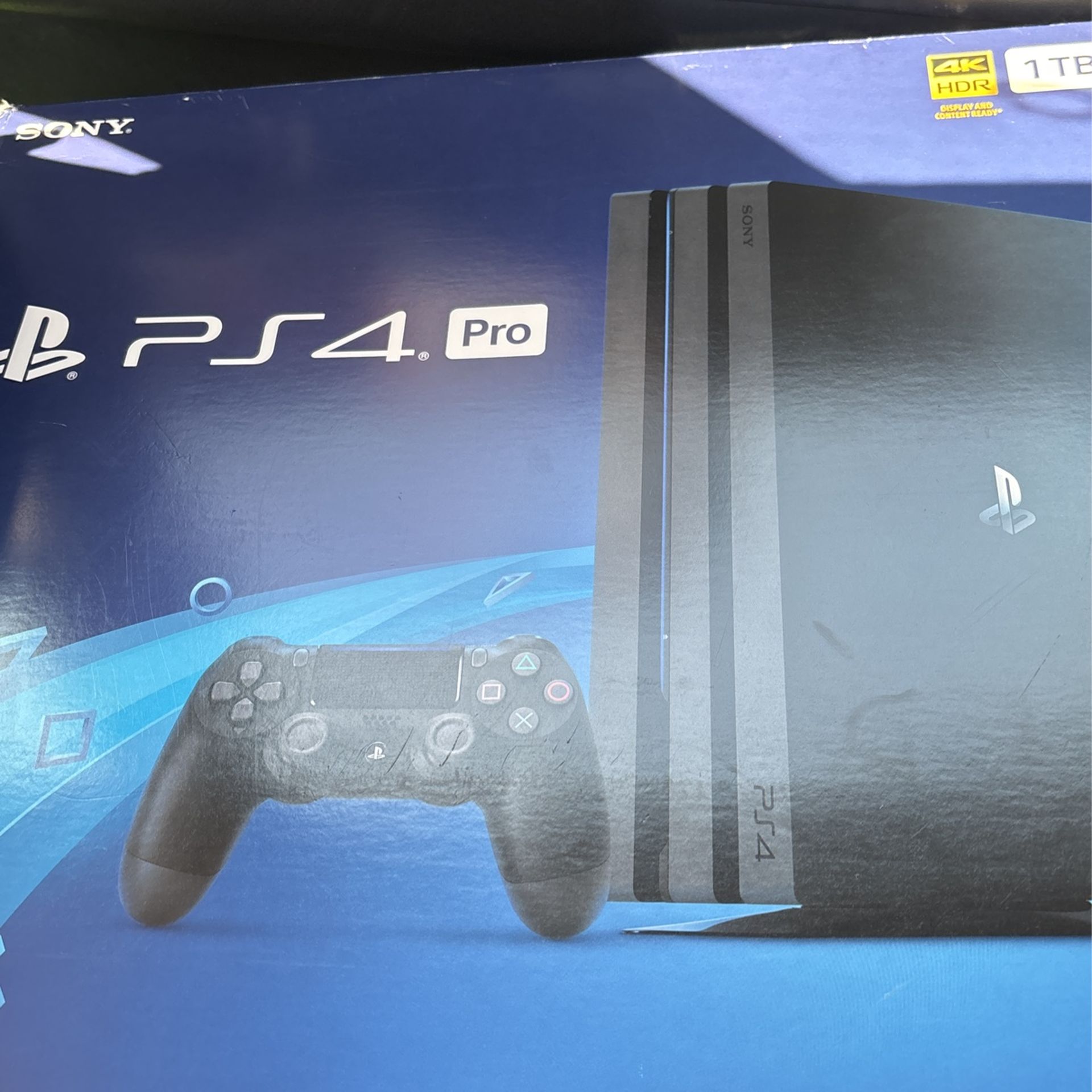 PlayStation 4 Pro With Game Consoles