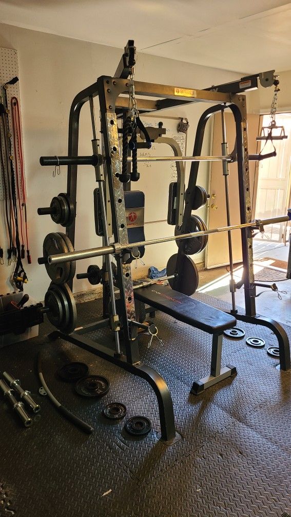 Complete Gym Set Up. Smith/free Weight Cage With 565lbs Of Weight And ...