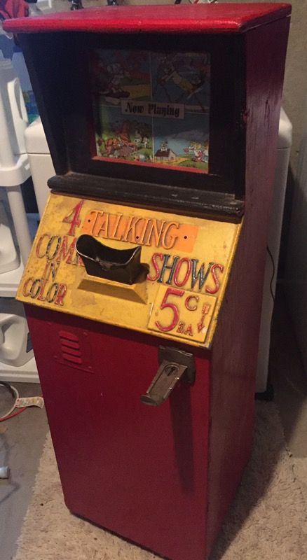 Antique coin-operated arcade cartoon film viewer peep show machine for ...