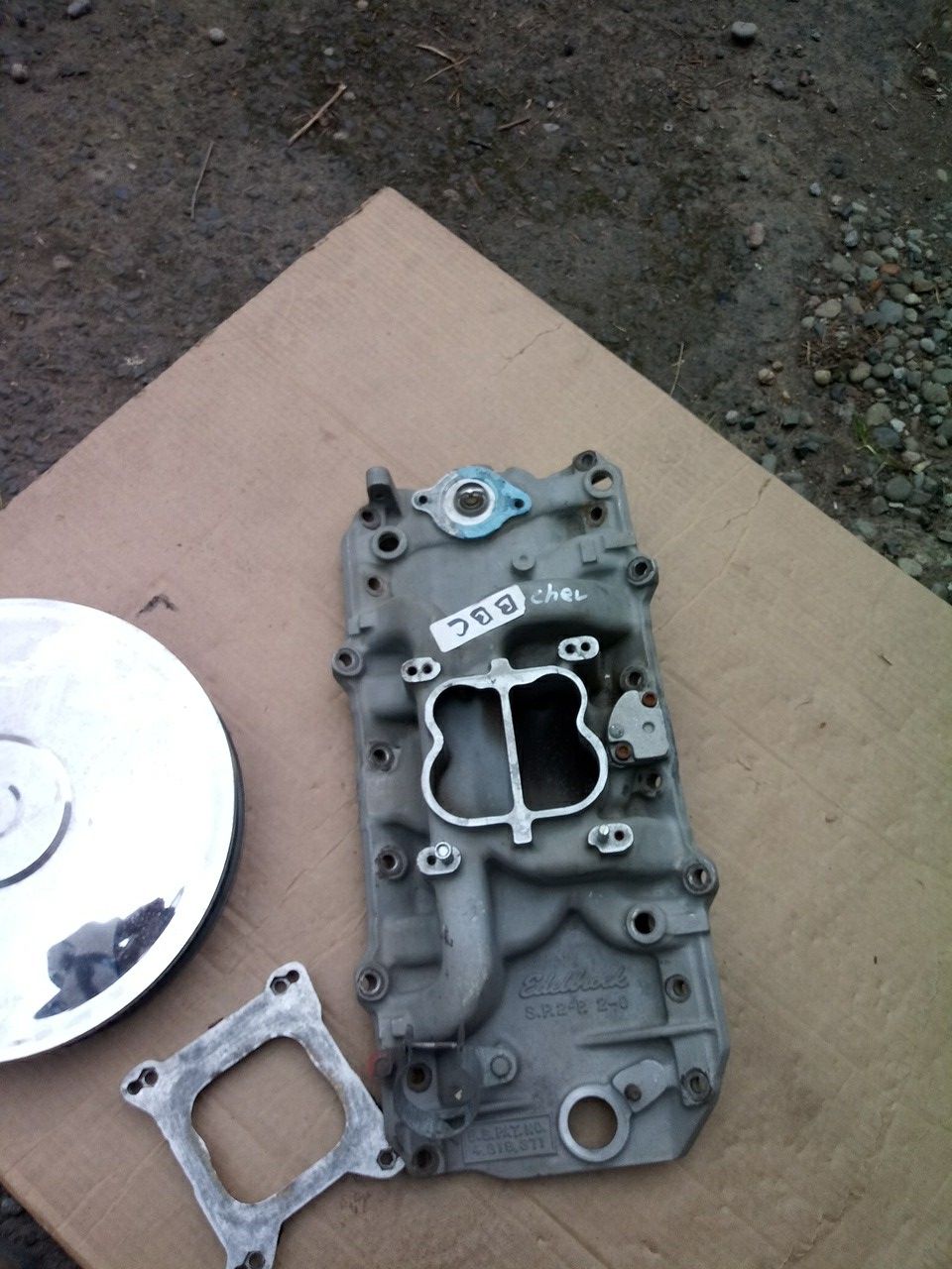 BBC Edelbrock intake manifold, card spacer, air cleaner for Sale in ...