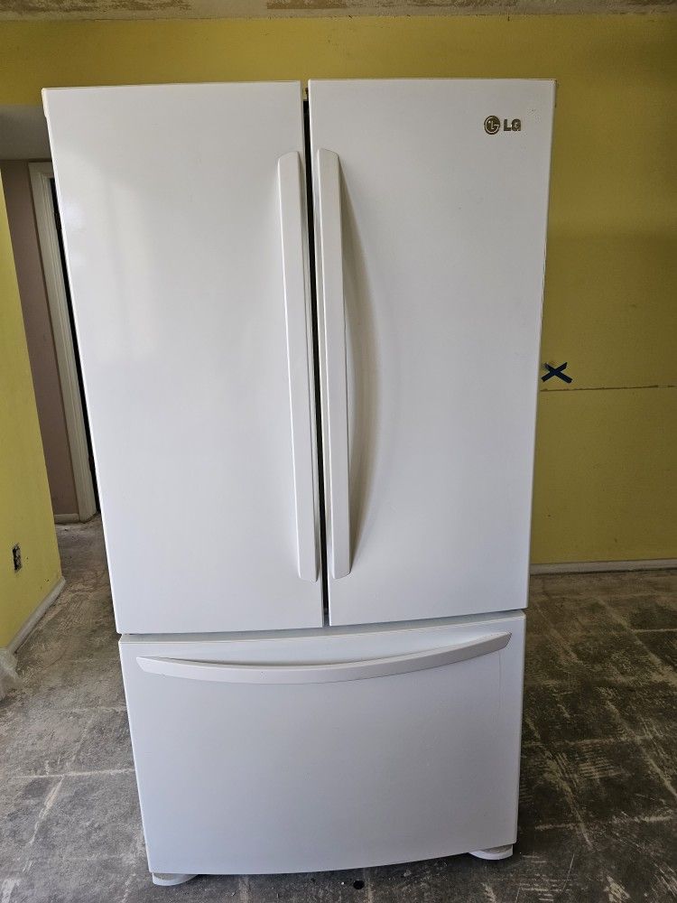 White Refrigerator With Stainless Handles