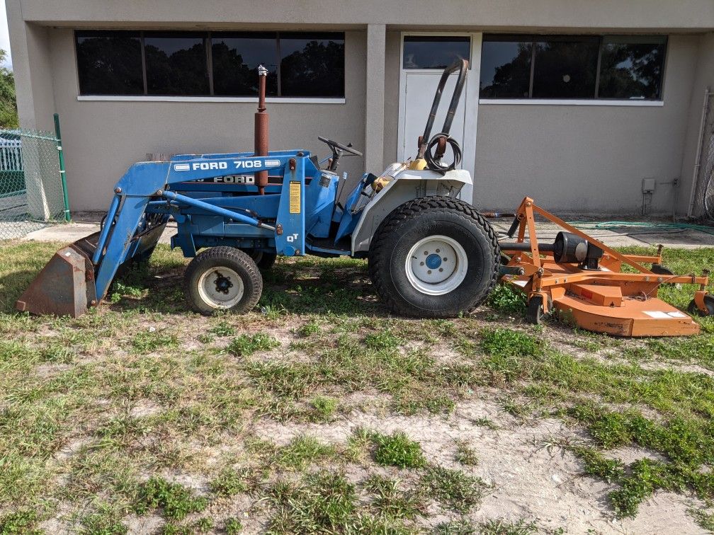 Ford 1520 tractor with front loader for Sale in Tampa, FL - OfferUp