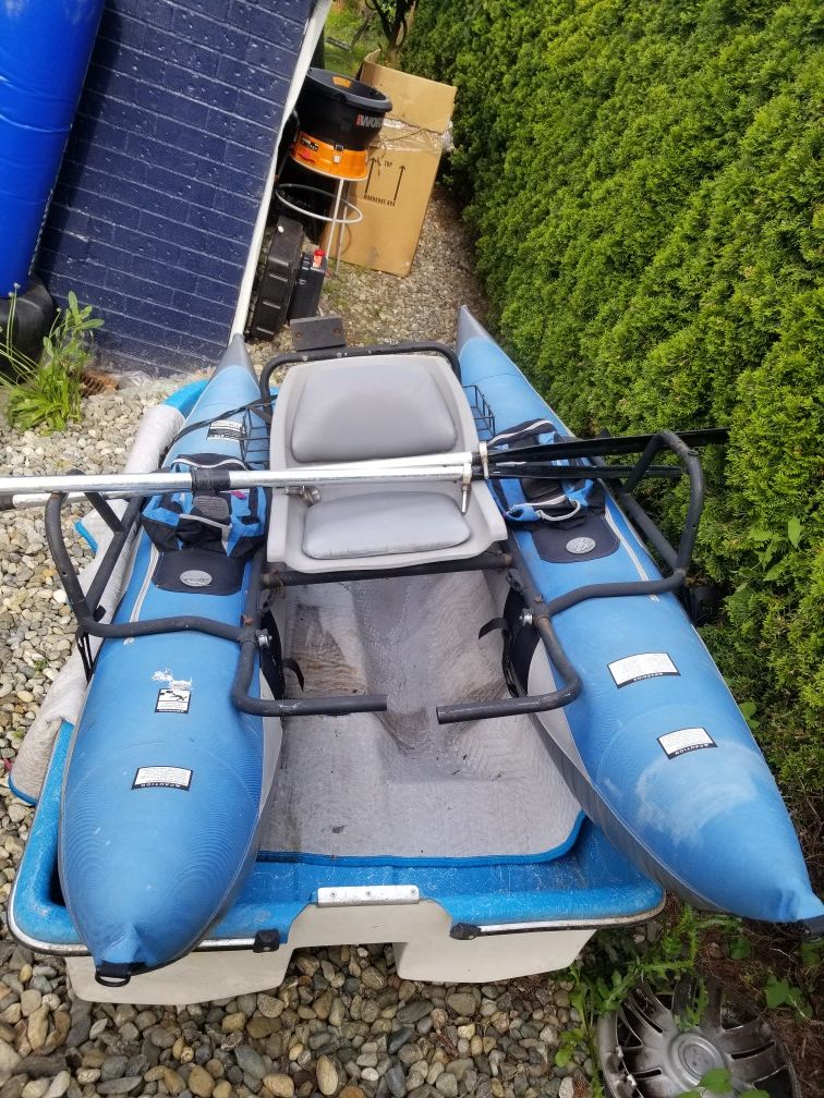 Wilderness 8ft pontoon boat, sm Minn kota electric motor and oars . for ...