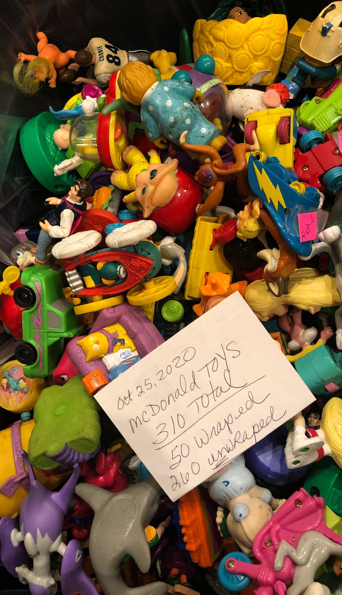 McDonald’s toys $50 unwrapped and 260 unwrapped a total of 310