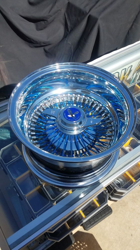 Candy blue spokes 13x7 wire wheels 72 spoke for Sale in San Bernardino ...