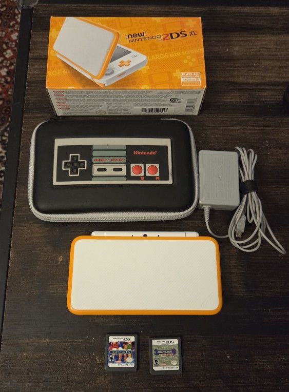 Nintendo 2DS XL orange with Games and Case for Sale in Irvine, CA - OfferUp
