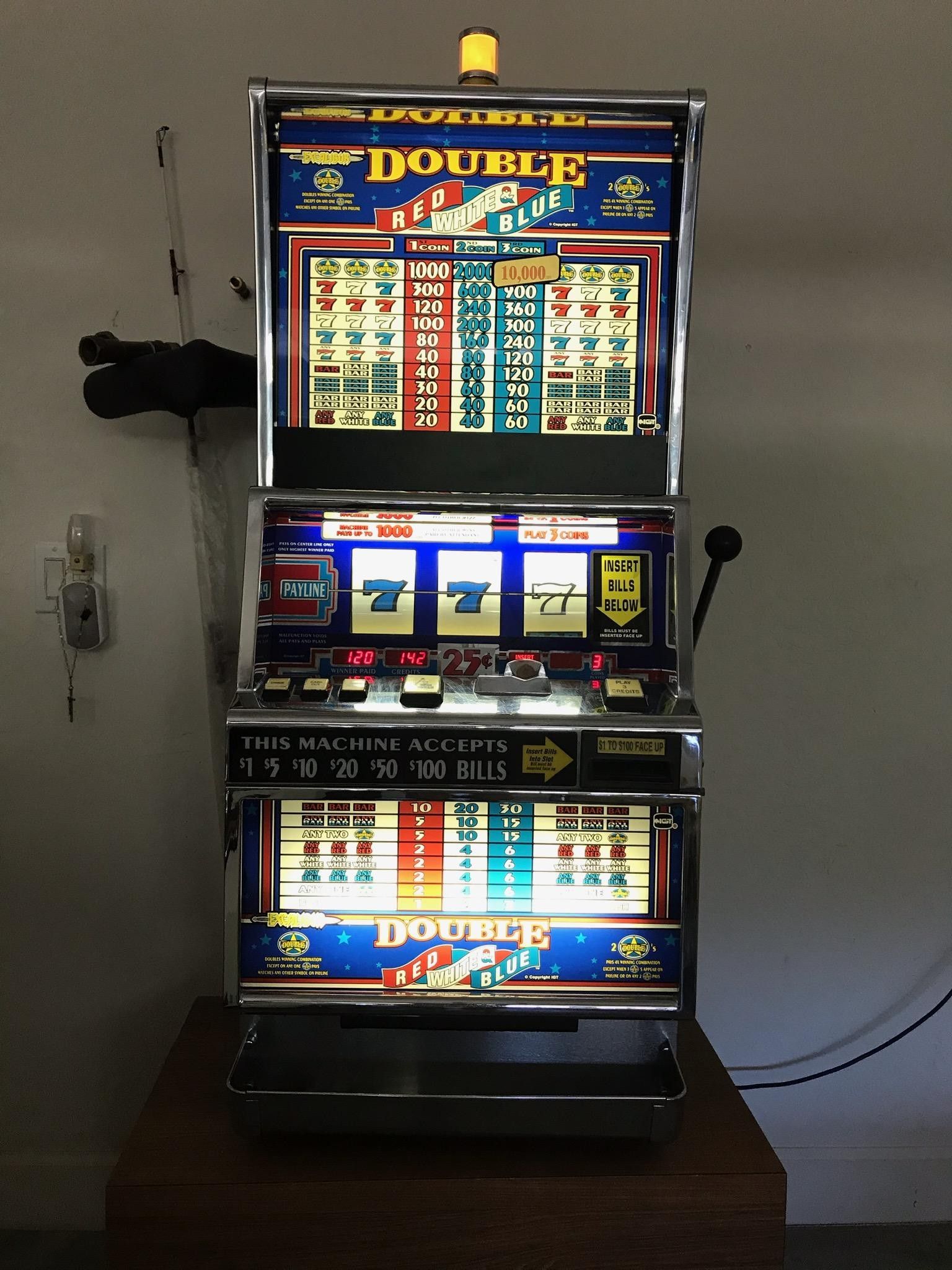 DOUBLE RED WHITE AND BLUE SLOT MACHINE. TAKES QUARTERS AND BILLS. COMES ...