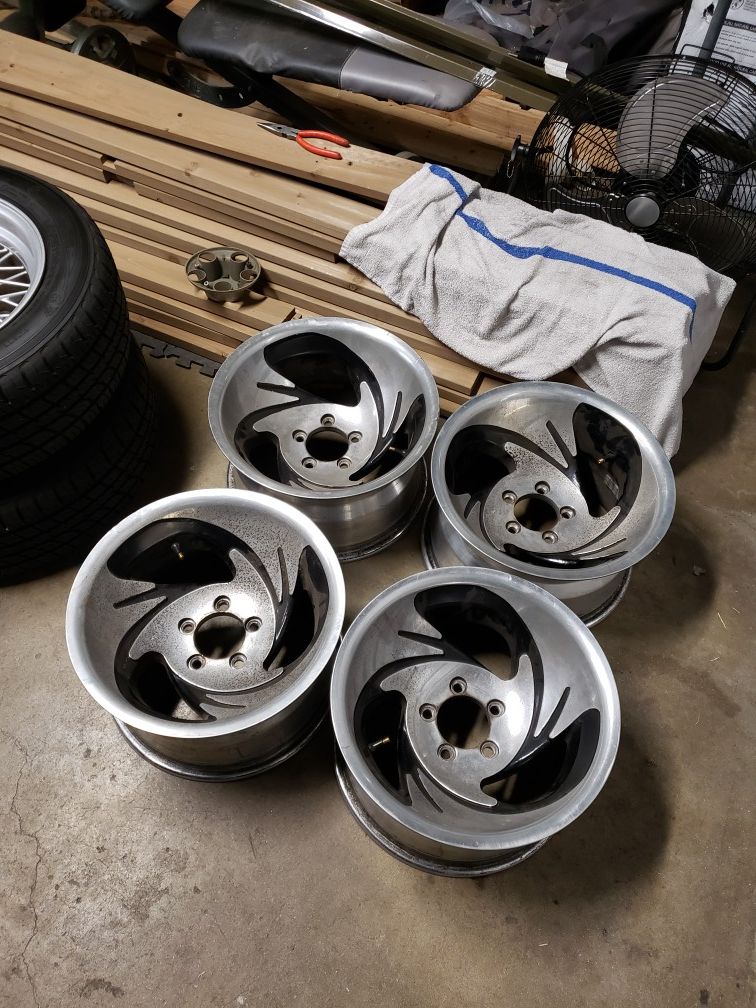 15x9 (5x4.5 / 5x114.3) Progressive Wheels with center caps for Sale in ...