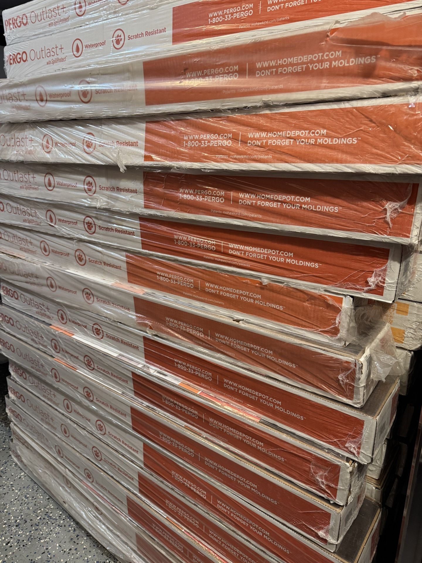 Outlast+ Java Scraped Oak 12 mm T x 6.1 in. W Waterproof Laminate Wood ...