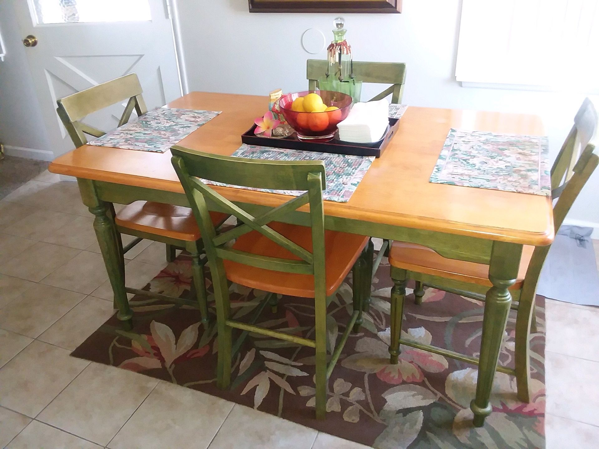 Hawaiian style dining table. Light brownish wood with green accents ...