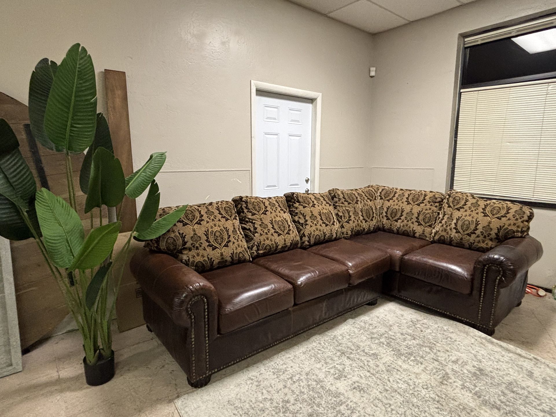 Real leather sectional couch with Sofa bed , delivery available for ...
