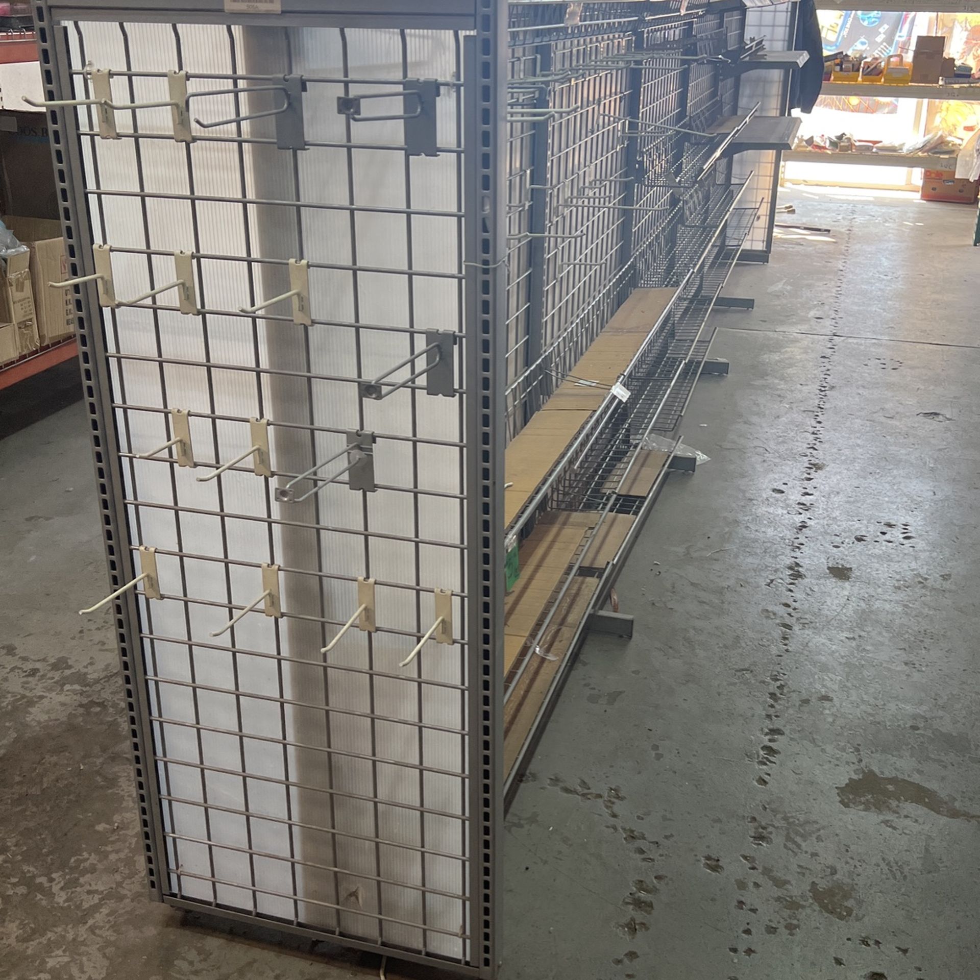 24 foot awesome display rack with grid wall baskets shelves and hooks ...