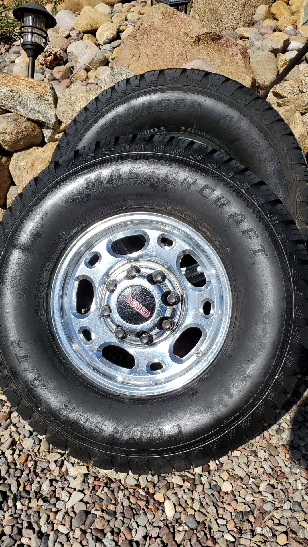 16" OEM wheels and 285/75/16 Mastercraft tires. One tire has apparently ...