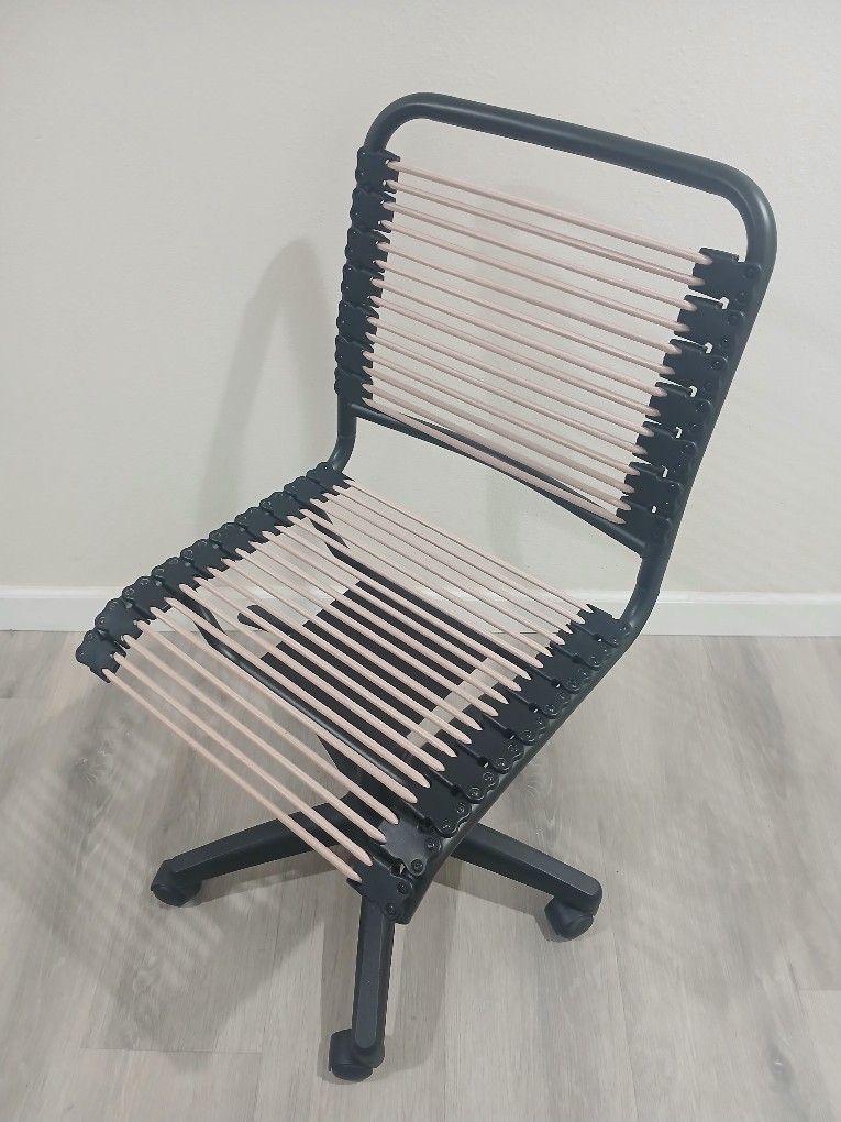 Container Store Bungee Office Chair with black frame and pink bungee ...