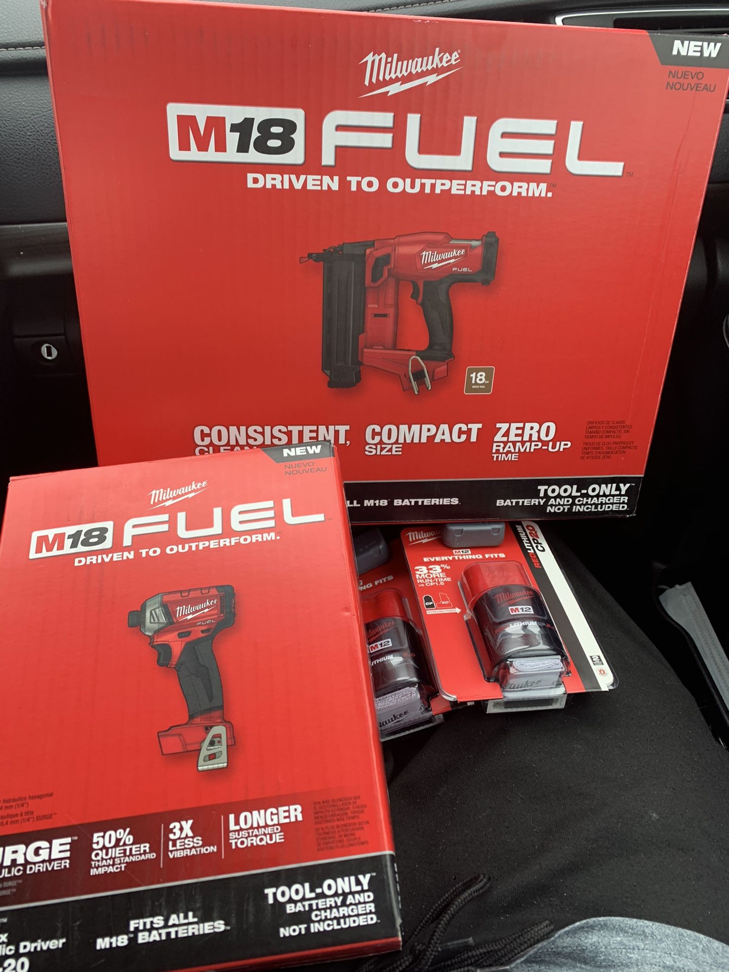 Milwaukee fuel M18 18 gauge nail gun. M18 fuel surge impact gun and 2 ...