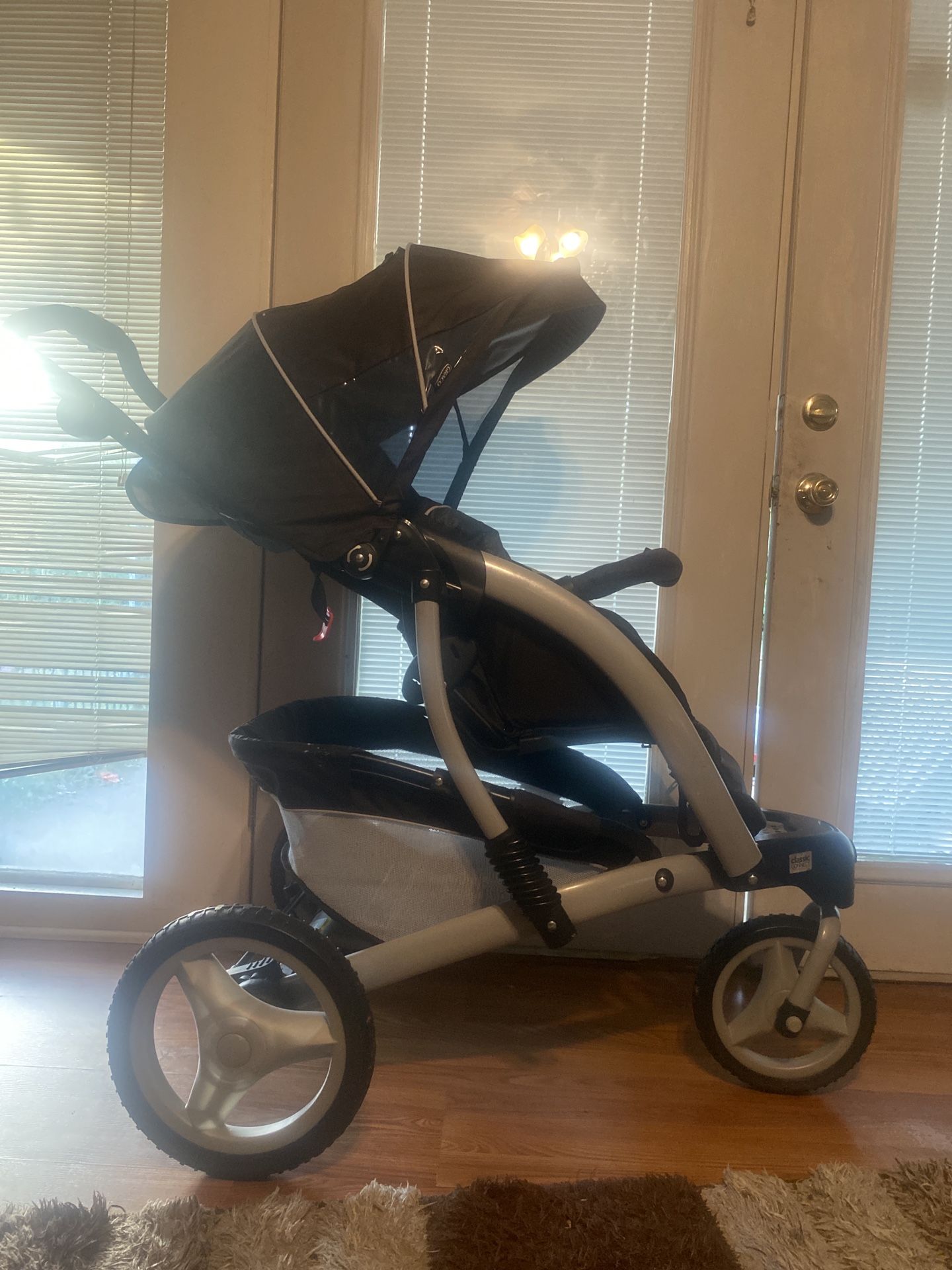 A Black And Grey Graco Jogger Baby stroller for Sale in Fayetteville ...