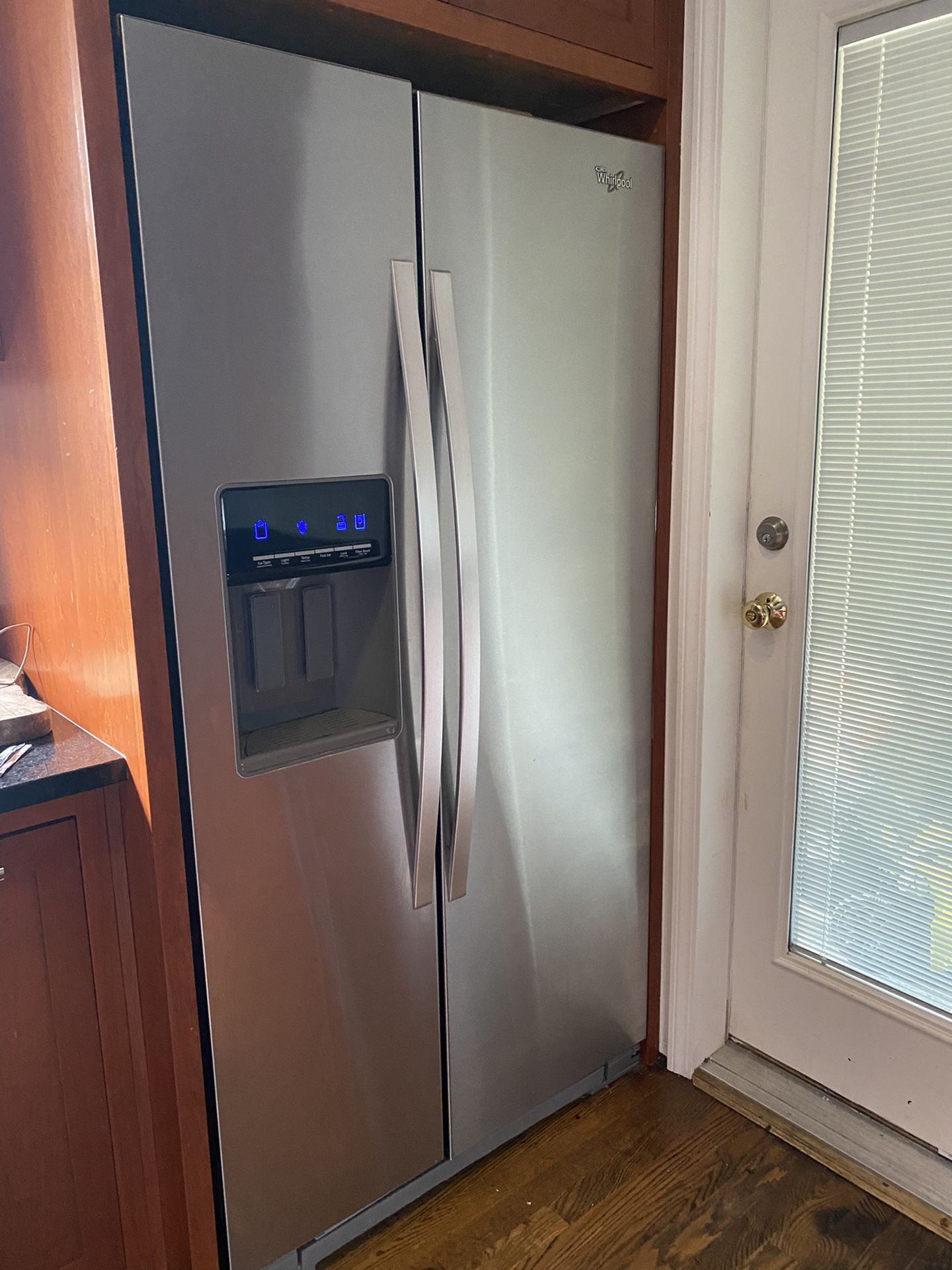 Whirl pool refrigerator stainless steel counter height 35 1/2 width 67. ...
