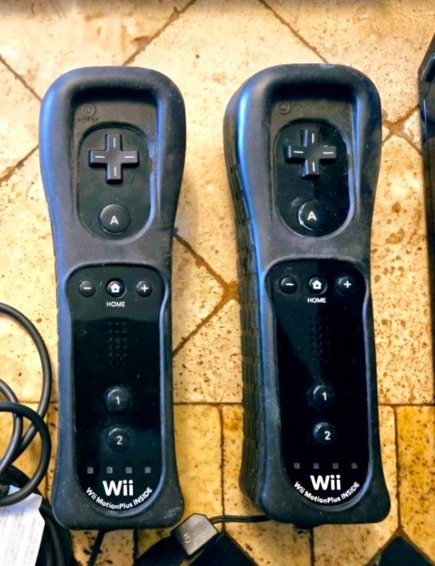 2 Nintendo Wii Motion Plus Controllers and Protective Sleeves. Check ...