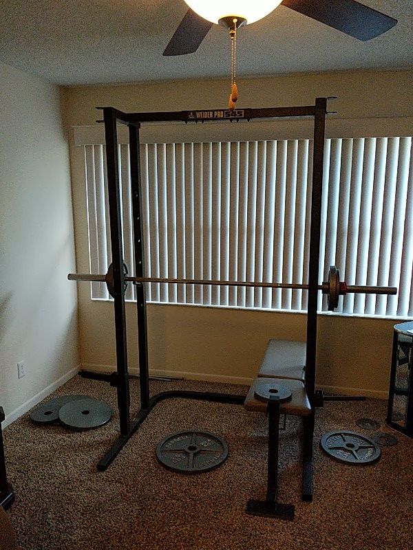 Weider pro 545 squat rack and weights for Sale in Stuart, FL - OfferUp