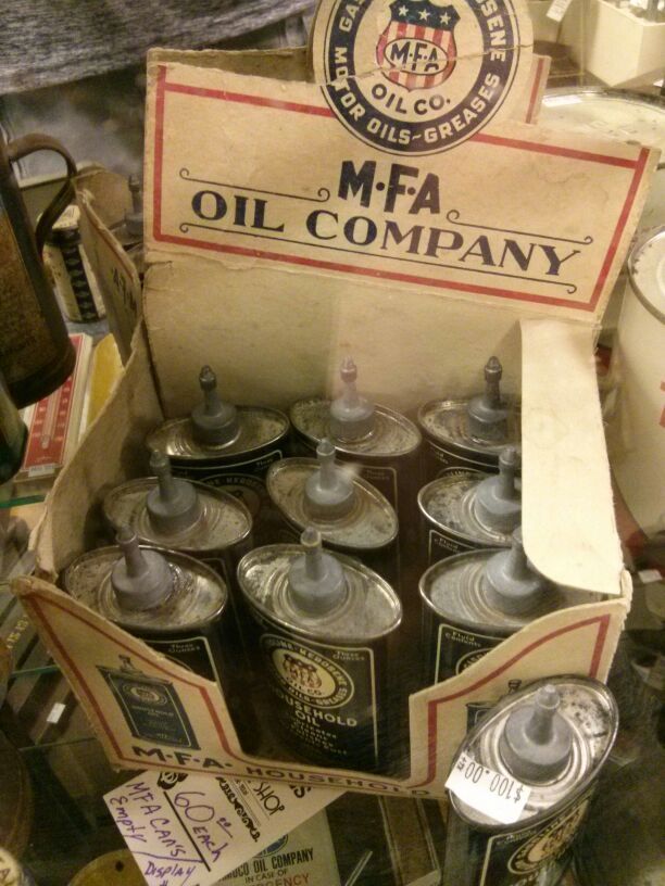 Complete MFA oil can display and 12 oil cans for Sale in Plano, TX ...