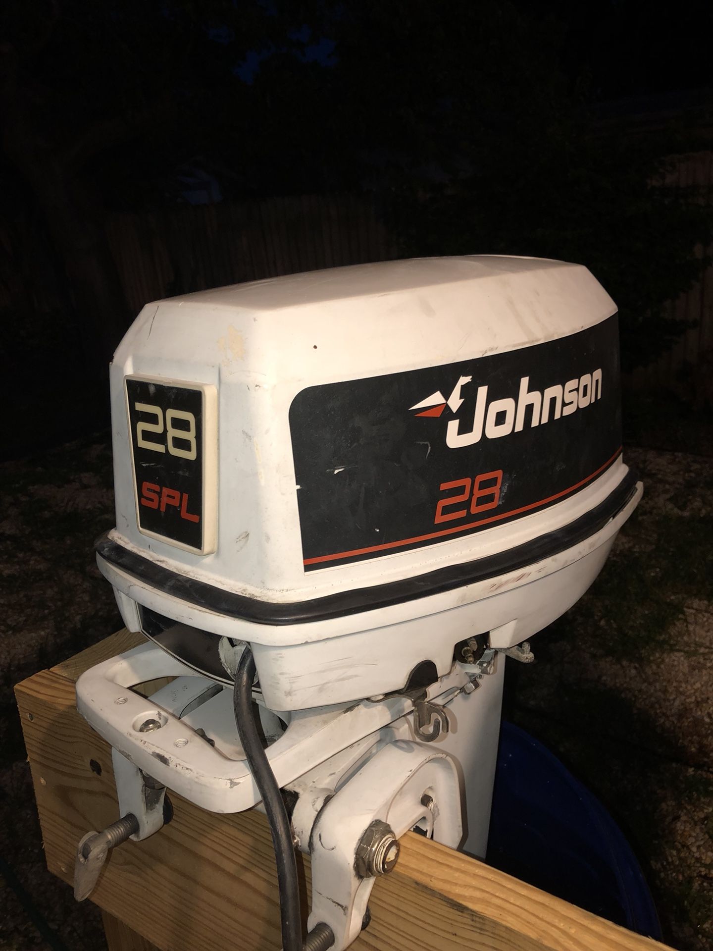 Outboard motor 28 Johnson. Comes with controls. Runs great on the stand ...
