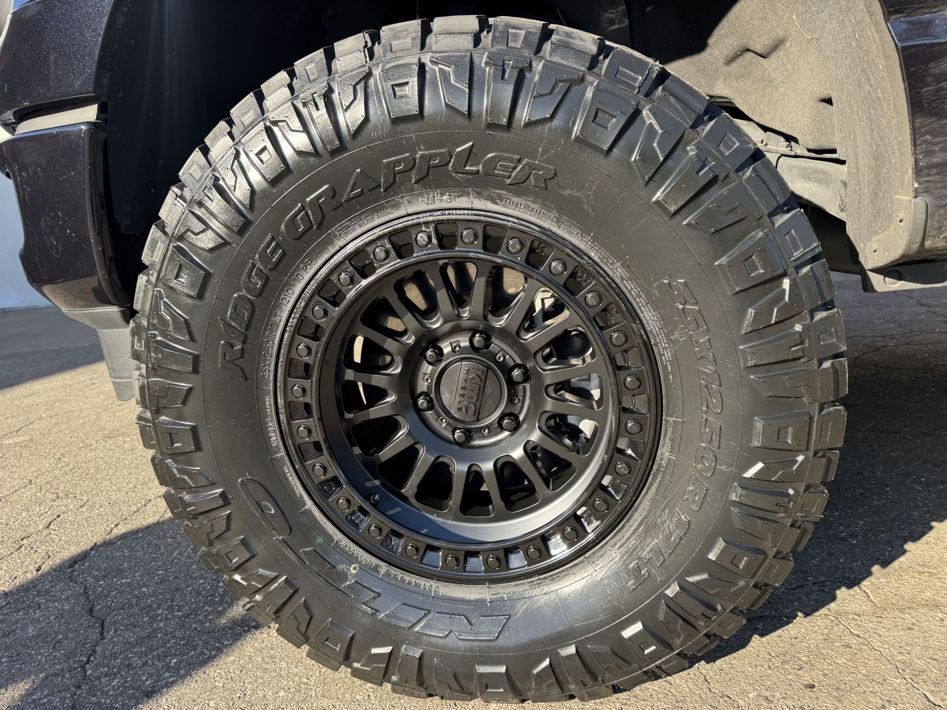 KMC IMS 552 17x8.5 Matte Black Wheels + 35x12.50R17 Nitto Ridge ...