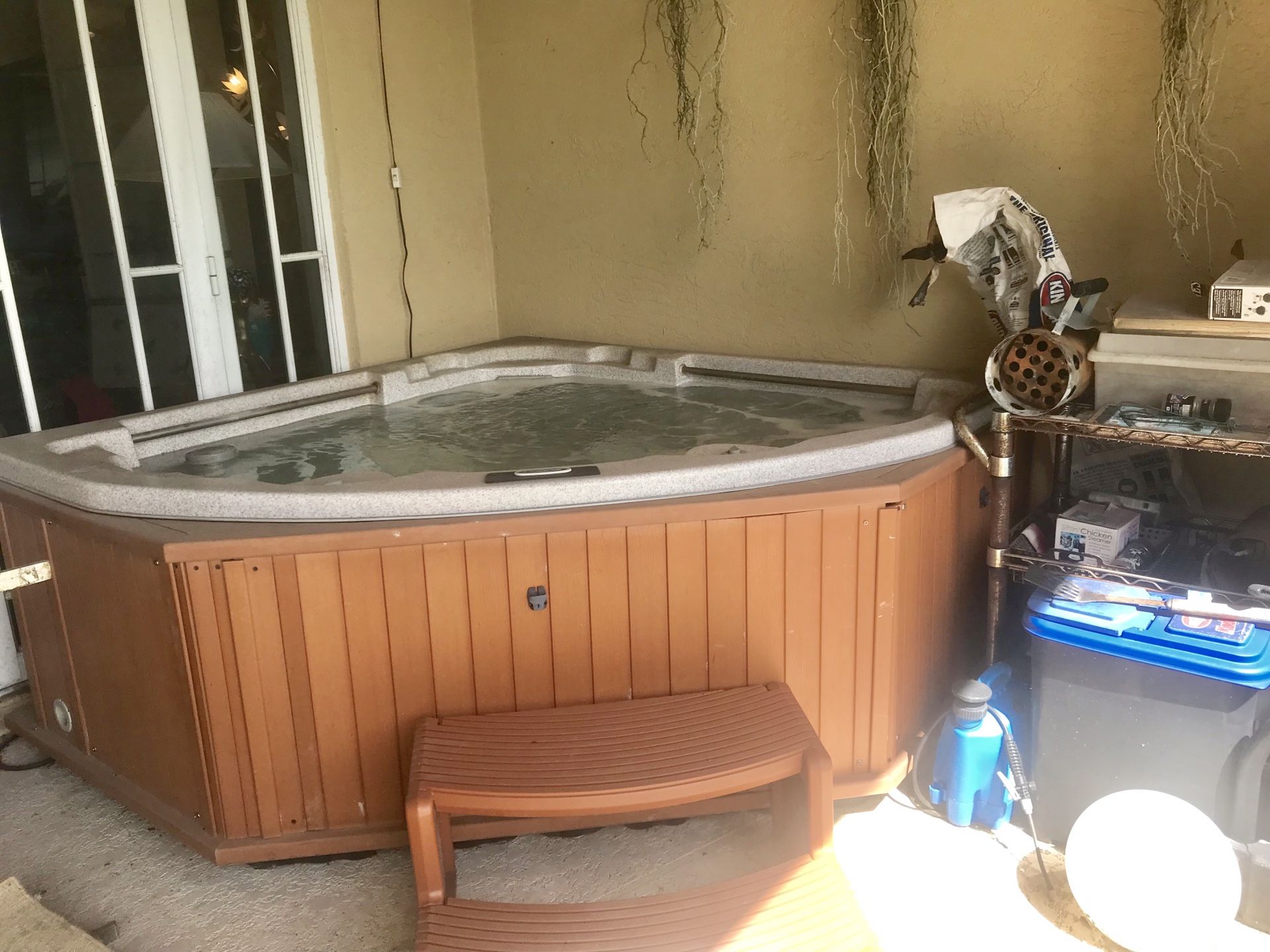 Corner hot tub. FUNCTIONAL & Weekly cleaned & serviced. for Sale in ...