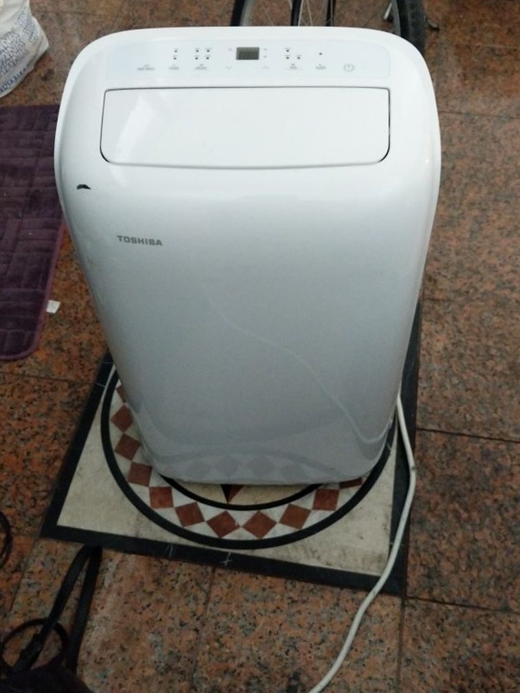 Toshiba Mobile Type Air Conditioner With Remote Control for Sale in ...