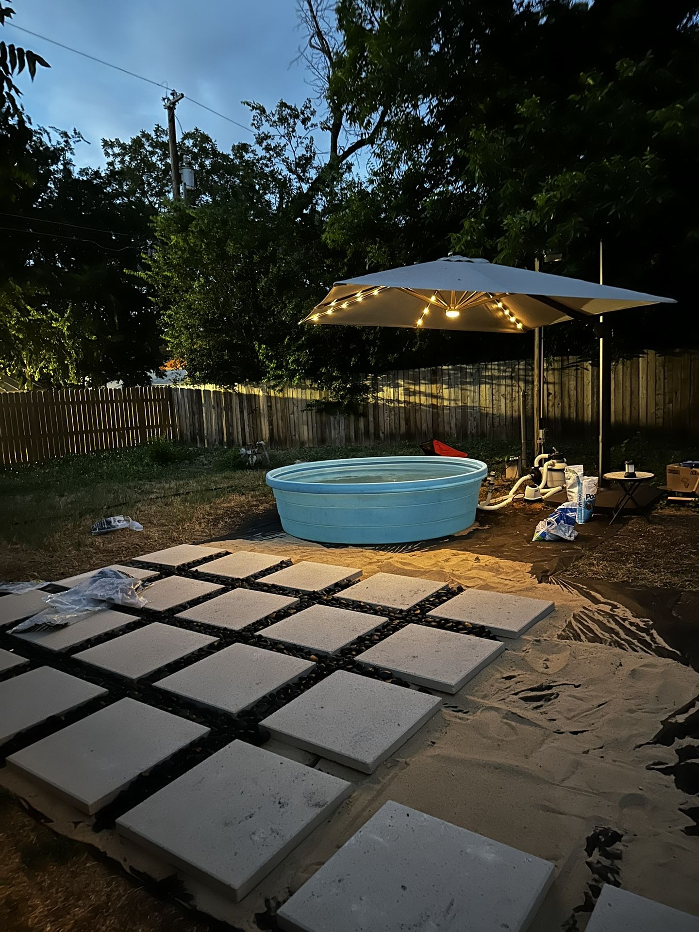 Stock tank pool with salt water filter & umbrella - 8 feet for Sale in ...
