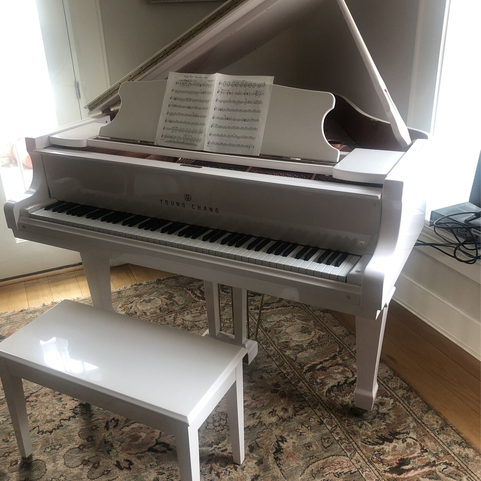 White Steinway Baby Grand Piano