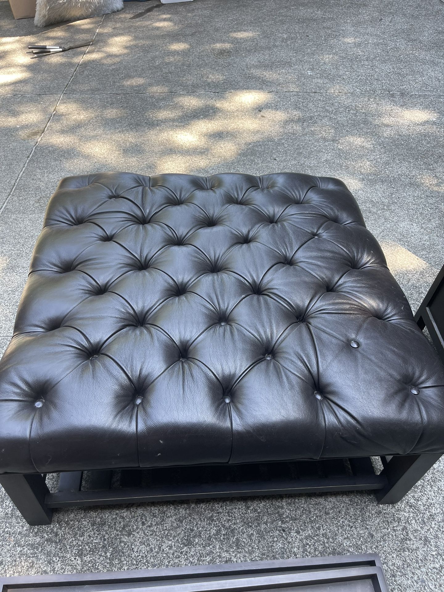 Arhaus Butler Leather underfoot Tufted