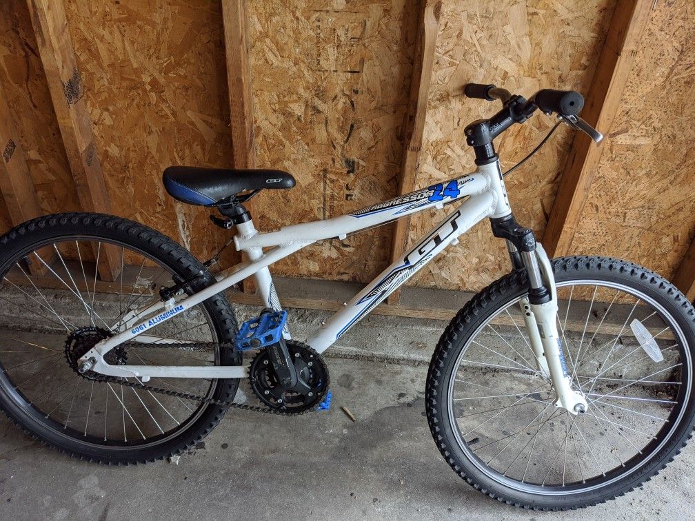 24 inch GT Aggressor boys mountain bike trade for ps4 for Sale in ...