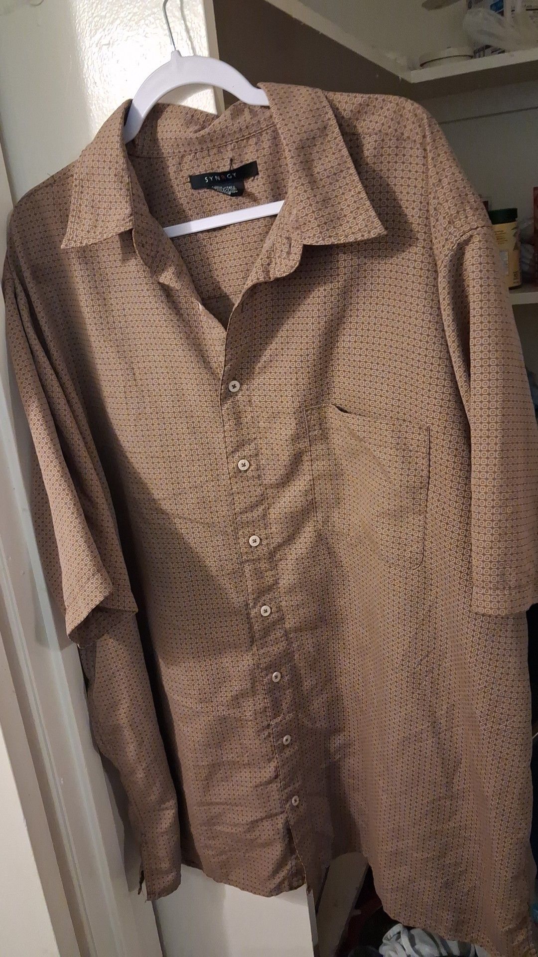 2 mens casual shirts, 1 brown colored short sleeve button up shirt, and ...