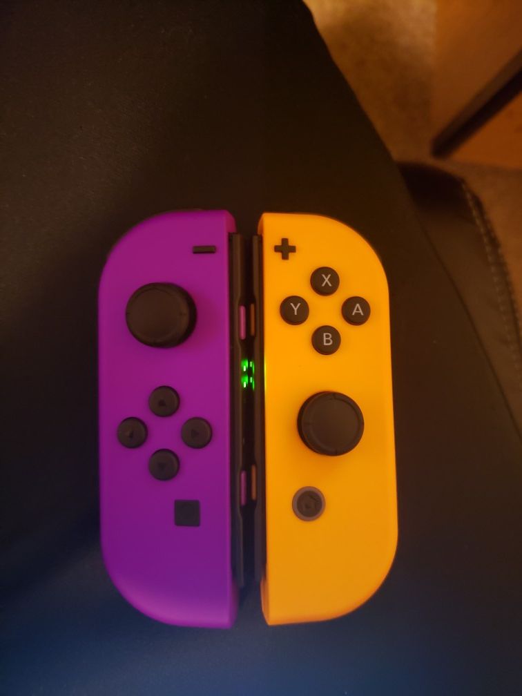 Switch JoyCons Purple/Orange for Sale in Everett, WA - OfferUp