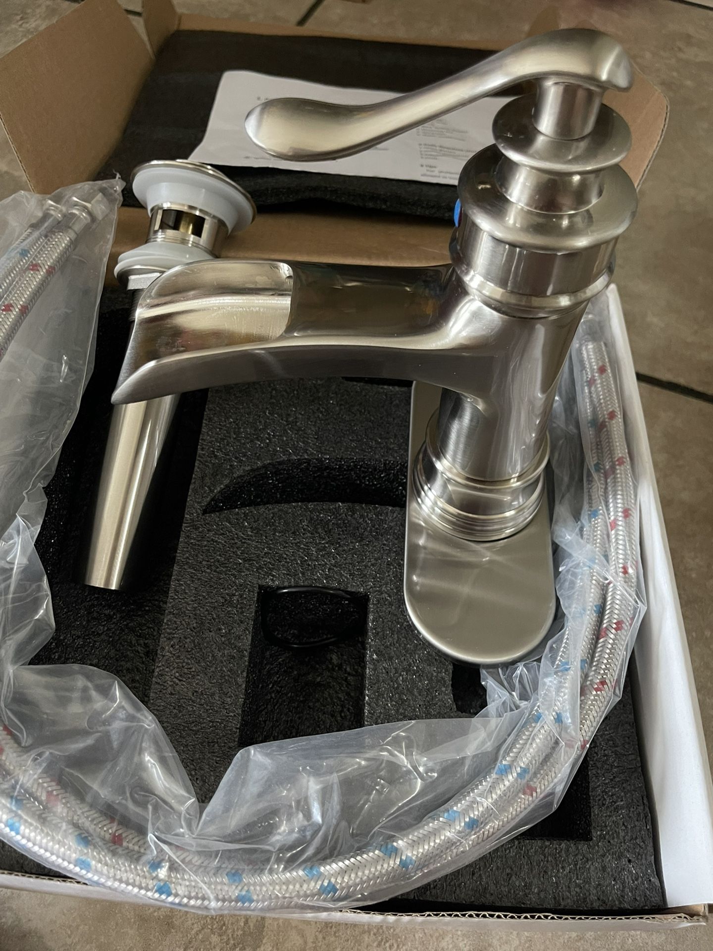 Brand new bathroom faucet includes hot/cold water hoses, drain, and ...