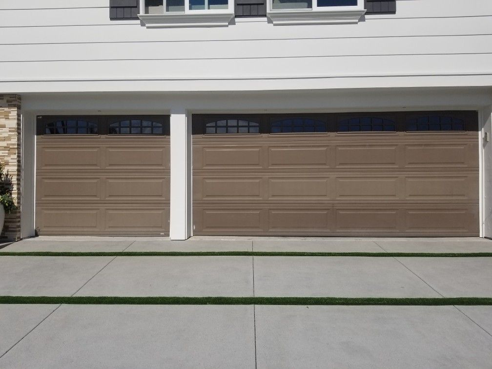 Used Garage doors 16x7 and 8x7 insulated with windows for Sale in ...