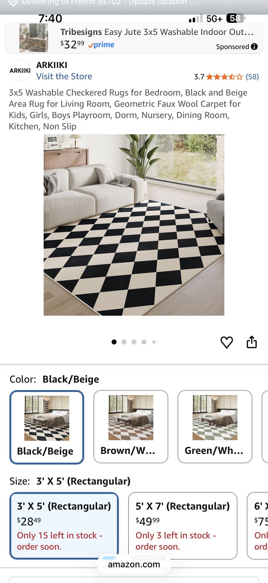 New sealed in box 3x5 washable checkered rug black and beige in color ...