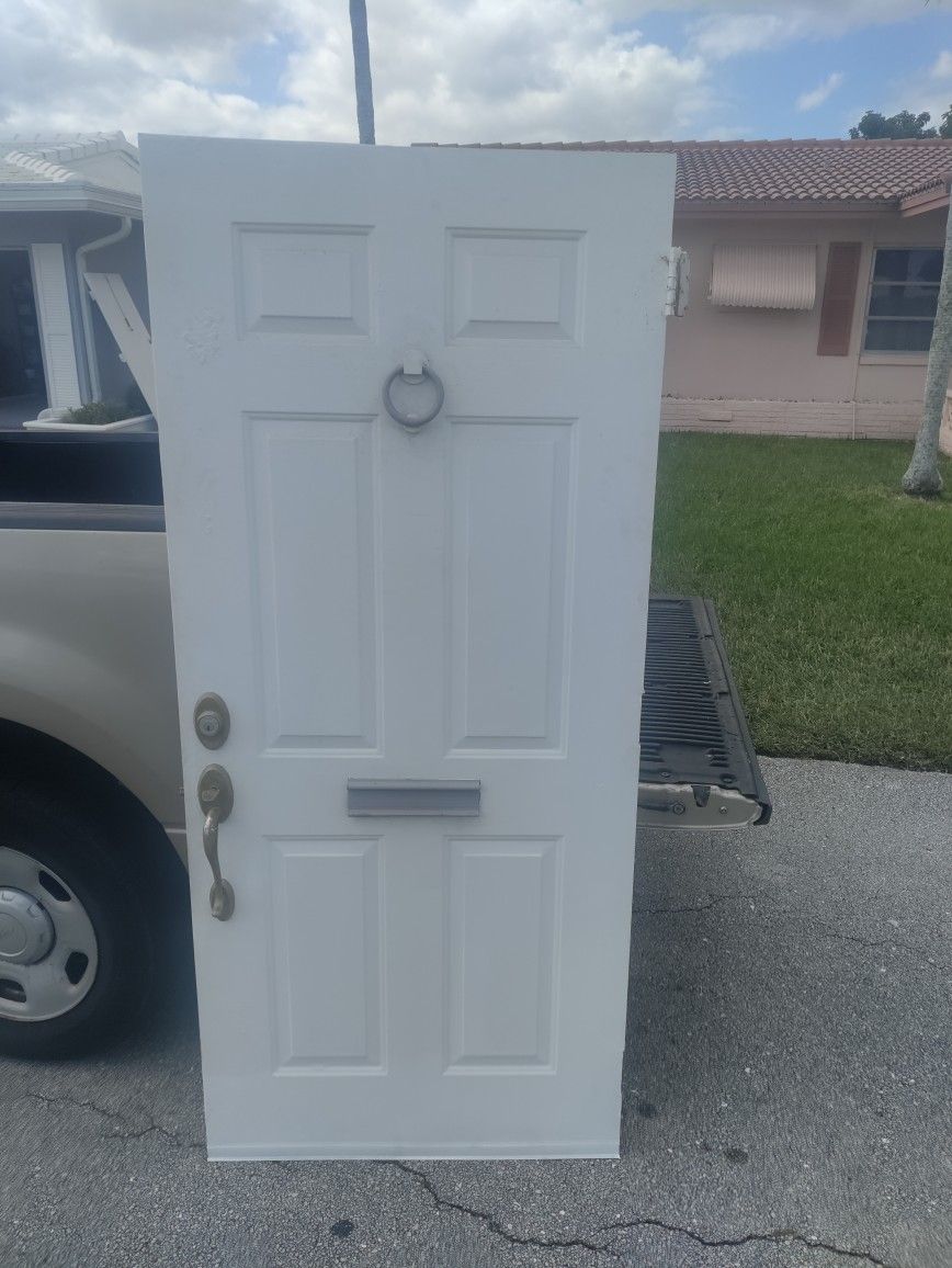Exterior Metal Door with Mailslot And Two Hinges Missing Some Minor ...