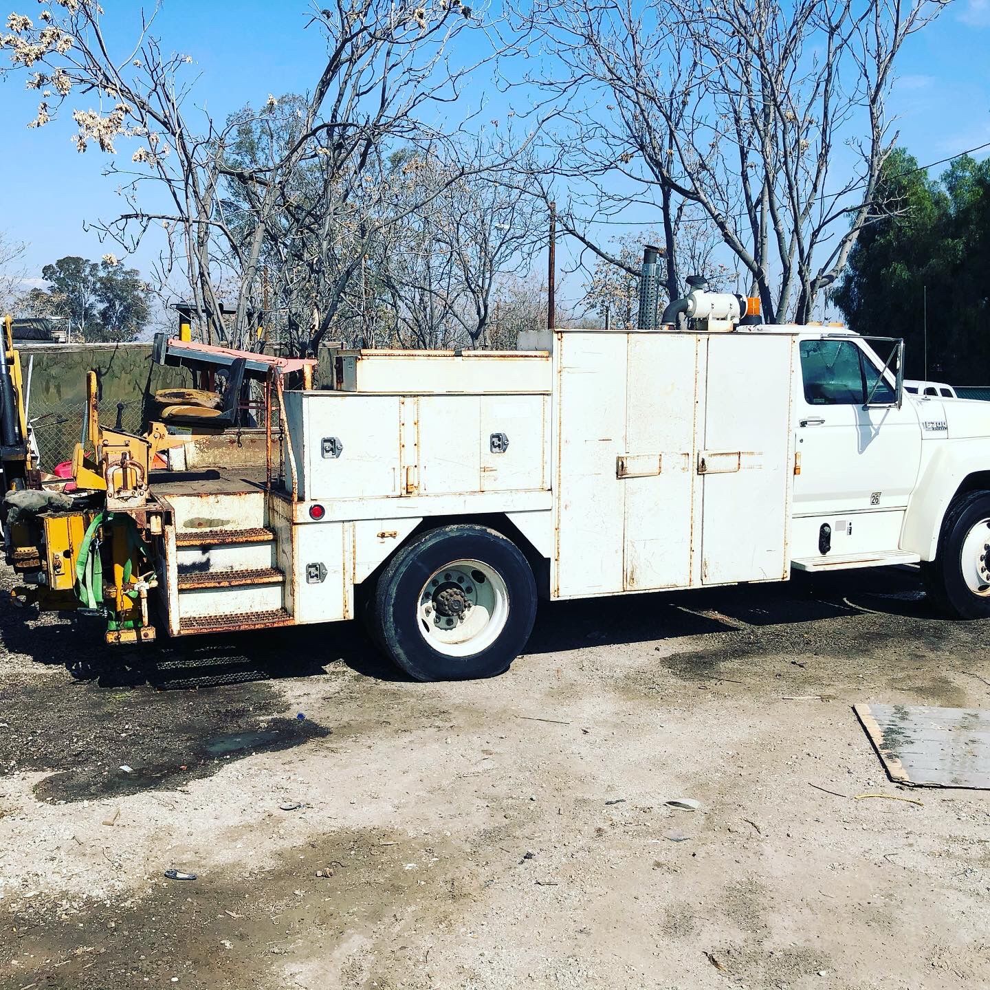 Ford F700 Service Truck With Boss Air compressor And Bradco Backhoe for ...