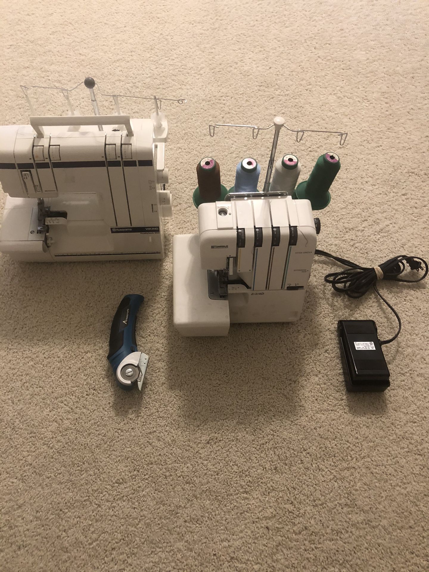 2 high end surge sewing machines and materials cutter for Sale in ...