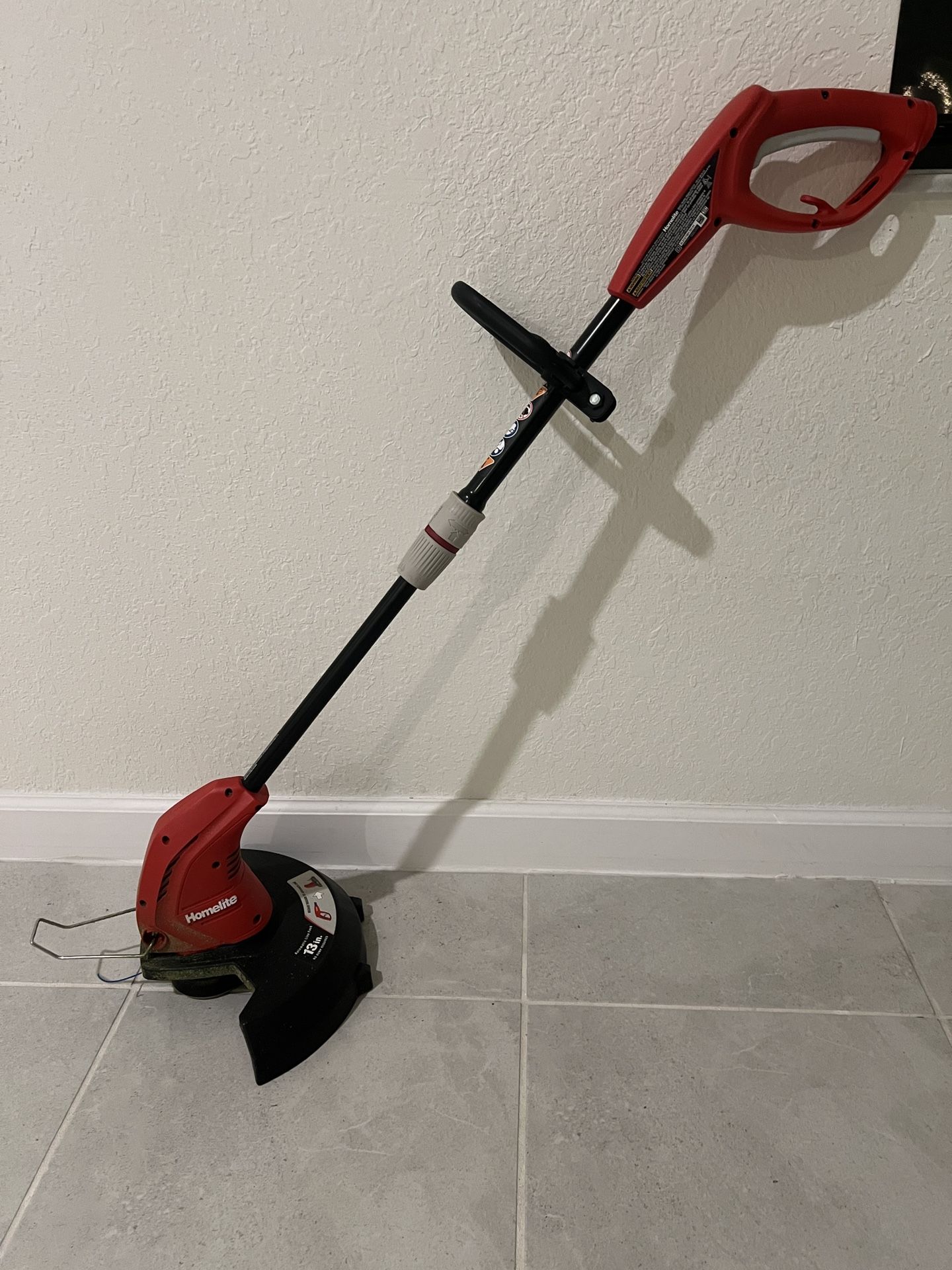 Homelite 13 in. 4 Amp Straight Electric String Trimmer for Sale in ...