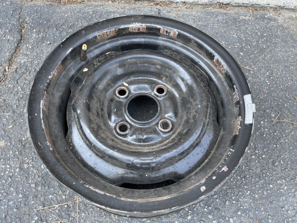 One Ford Falcon steel wheel. 4x4.5 lug pattern, 13 inch stock rim for ...